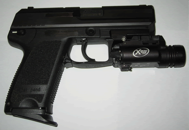 Holster for USP 9c with surefire light | HKPRO Forums